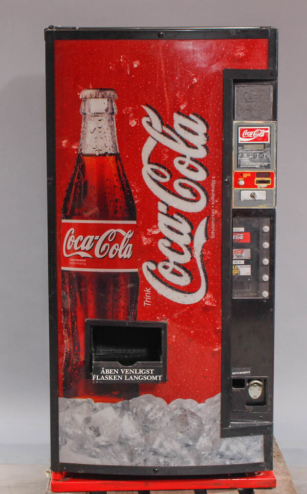 Slutpris för Coca Cola. Mini Pom automat