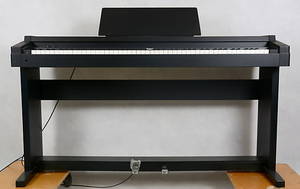 Slutpris för ELPIANO, Roland HP-1500.